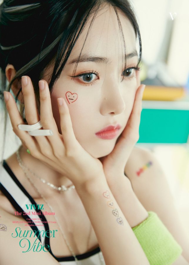 Watch: VIVIZ Charms In Summery MV For “LOVEADE” Comeback | Soompi